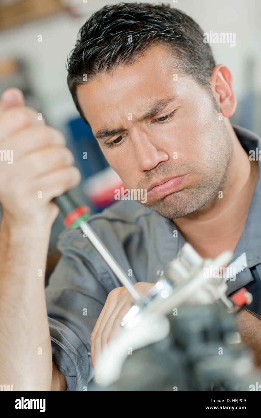 Car mechanic confused hi-res stock photography and images - Alamy