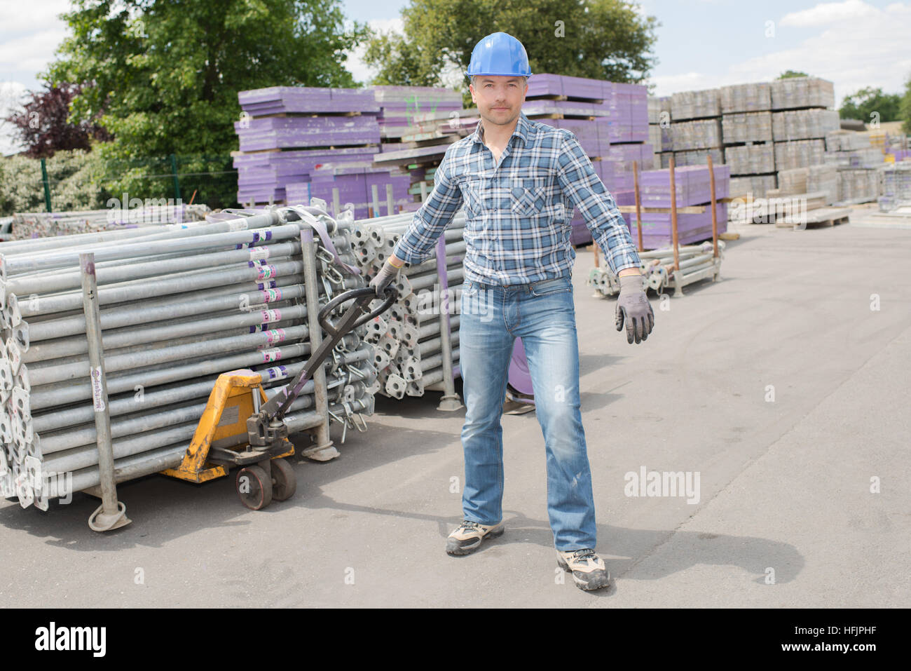 laborer using a pull cart Stock Photo - Alamy