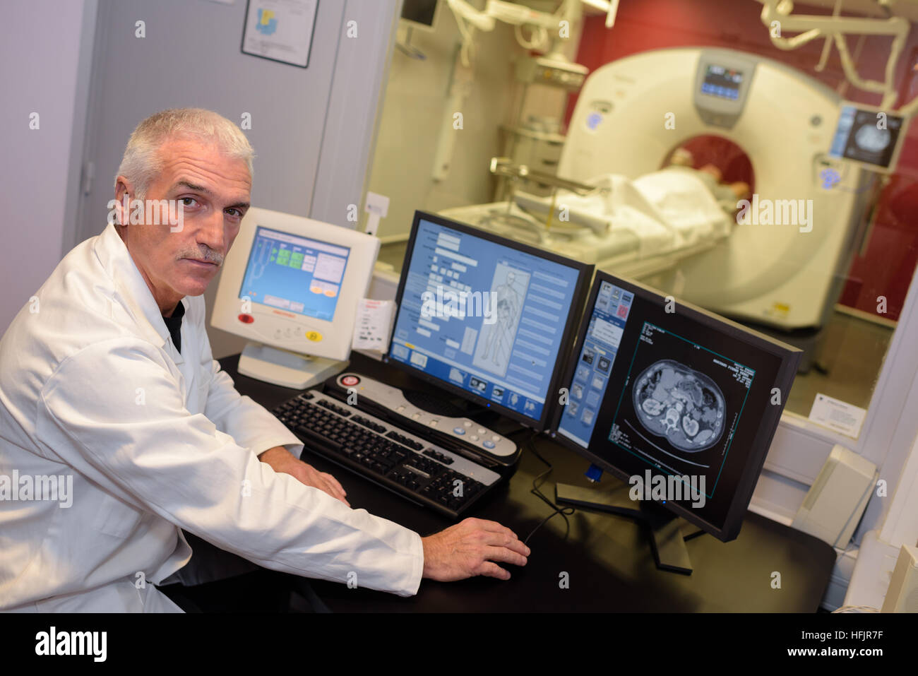 MRI technologist posing Stock Photo - Alamy