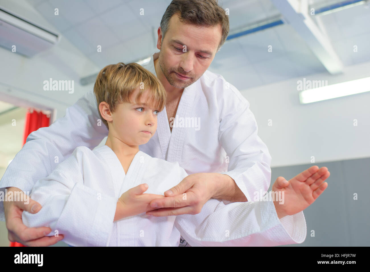 Little boy in a karate lesson Stock Photo - Alamy