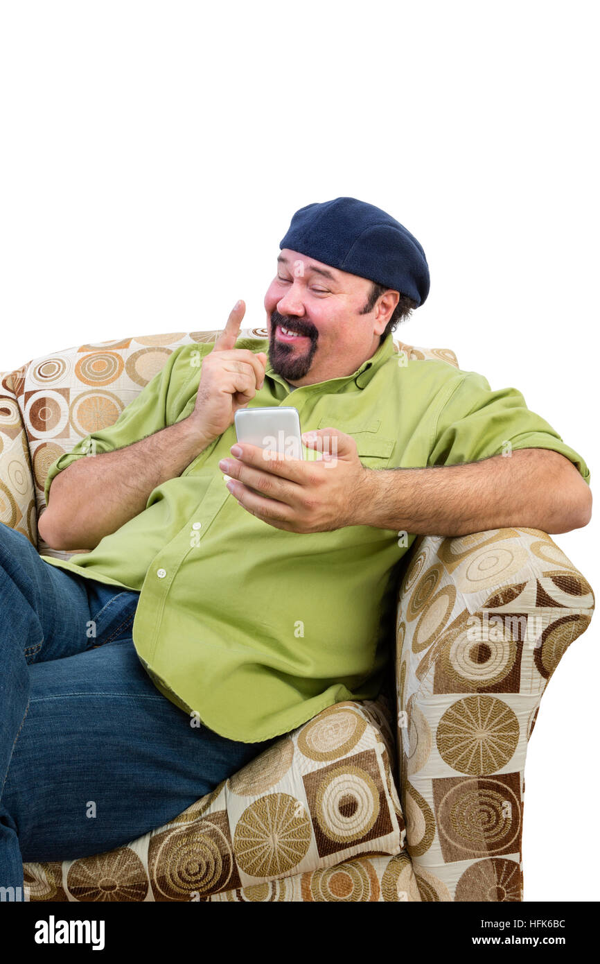 Overweight man slouching in armchair with mobile wagging finger, white ...