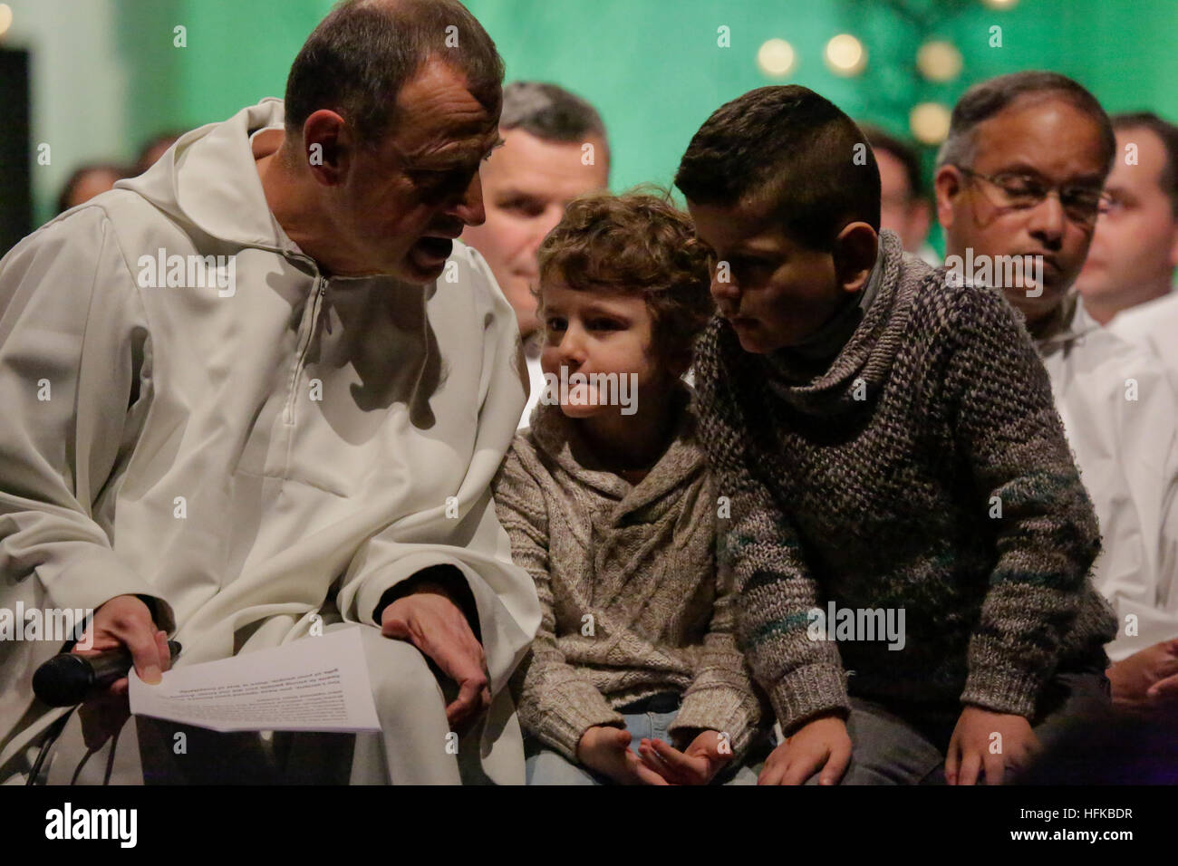 Brother Alois, the Prior of the Taize Community, is pictured with two ...
