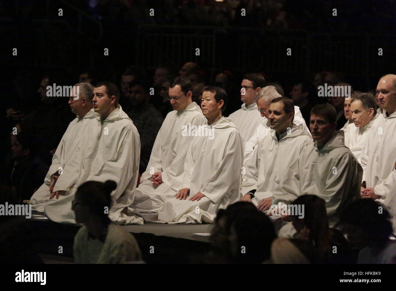 The brothers from Taize sit among young pilgrims. Brother Alois, the ...