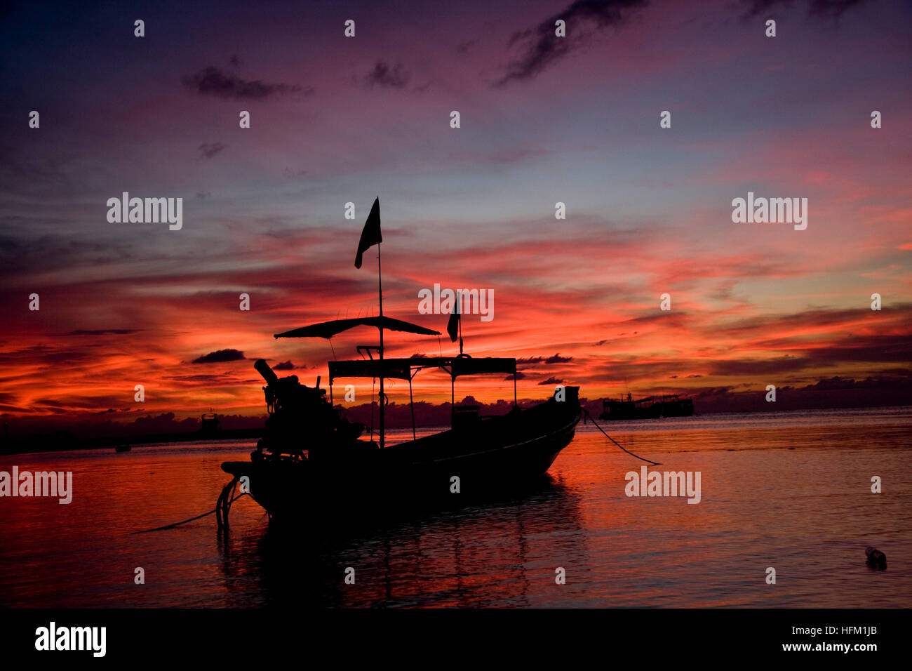 Red light after sunset in Koh Tao Stock Photo - Alamy