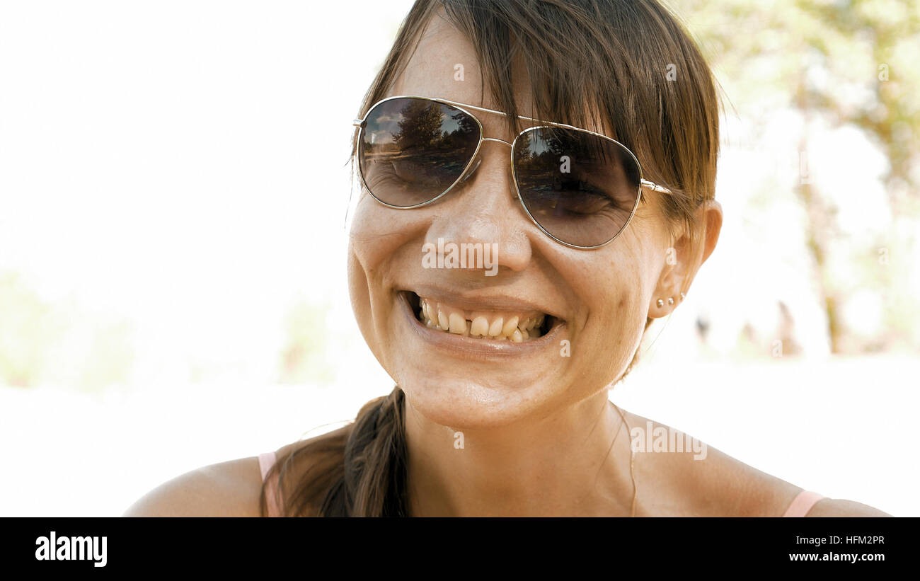 Woman is laughing expressively and emotionally Stock Photo - Alamy
