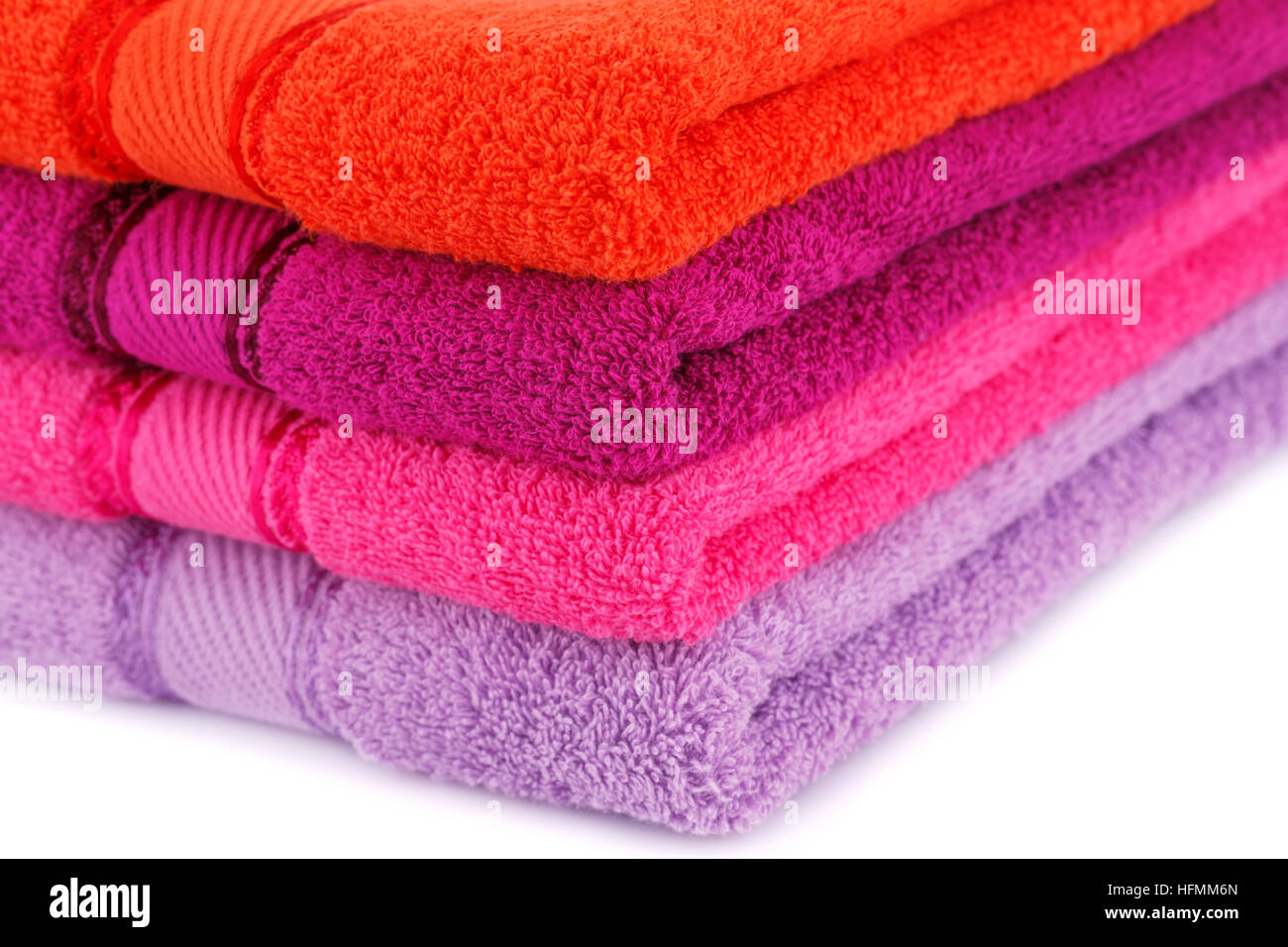 Colorful towels stack closeup picture Stock Photo - Alamy