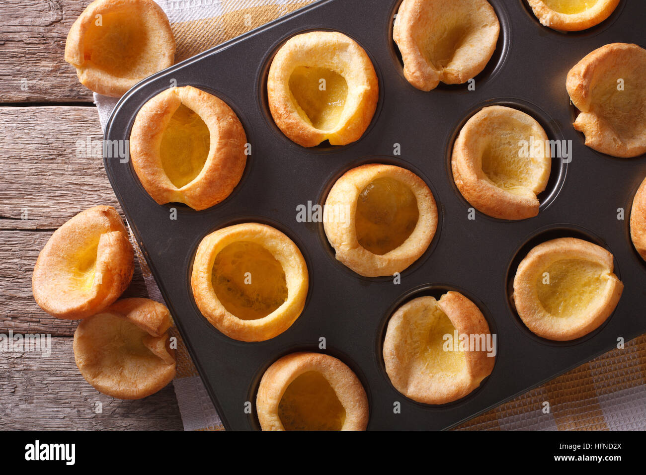 delicious Yorkshire puddings in baking dish closeup. horizontal top ...
