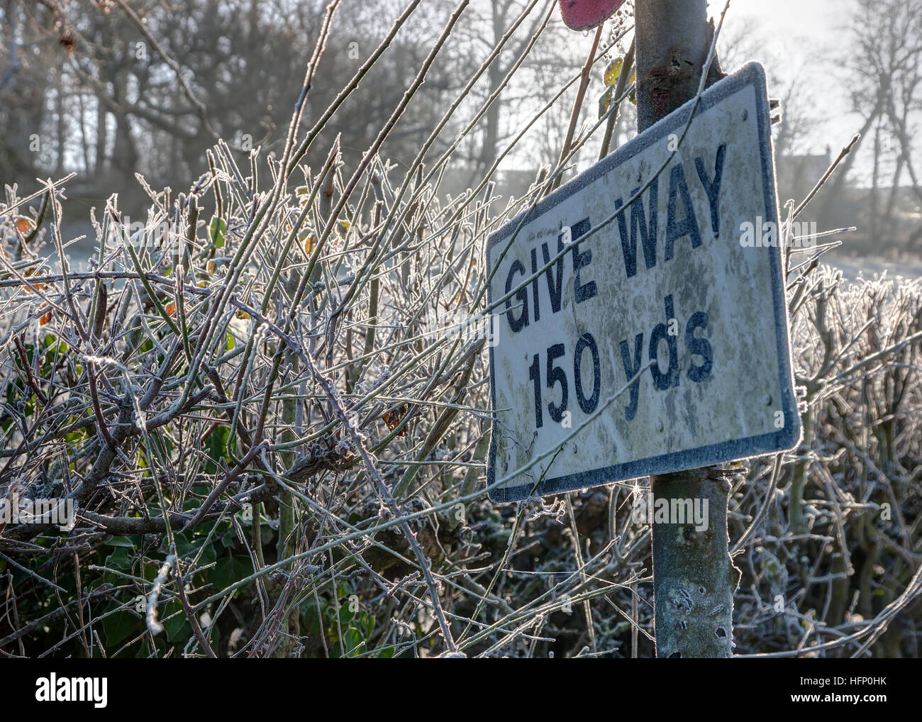 Slippery when frosty road sign hi-res stock photography and images - Alamy