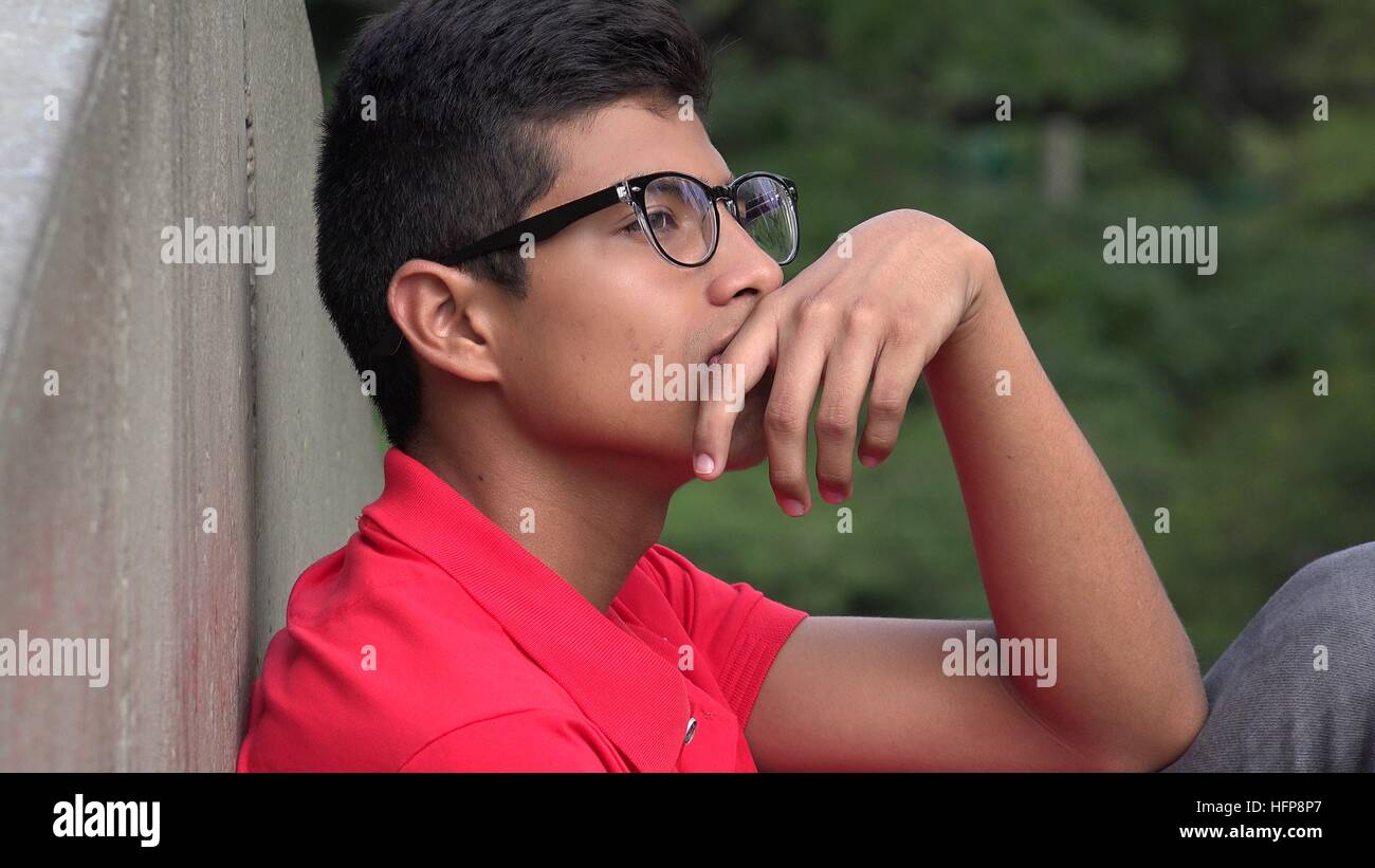 Intelligent Teen Hispanic Boy Thinking Stock Photo - Alamy