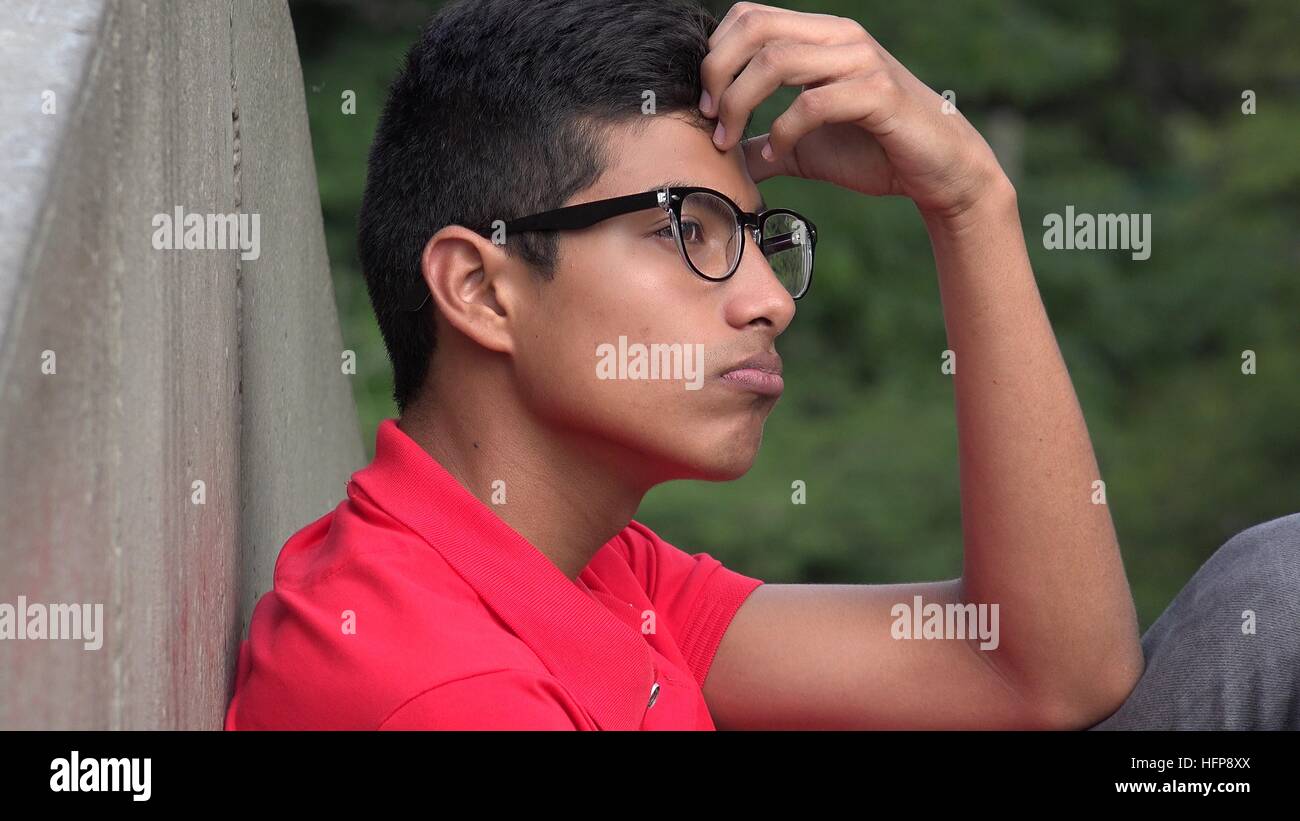 Intelligent Teen Hispanic Boy Thinking Stock Photo - Alamy