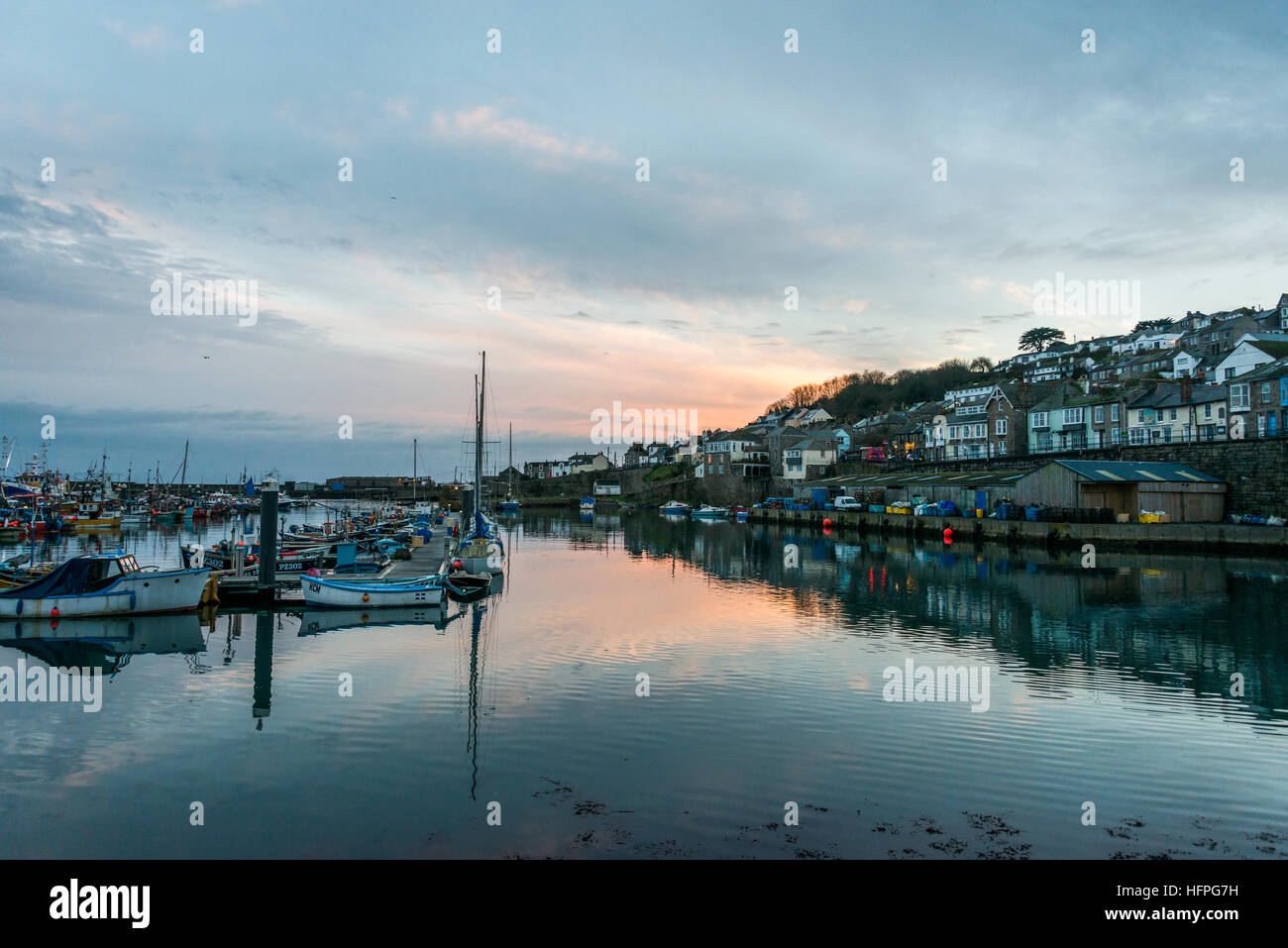 Sunset in Newlyn harbour, Cornwall Stock Photo - Alamy