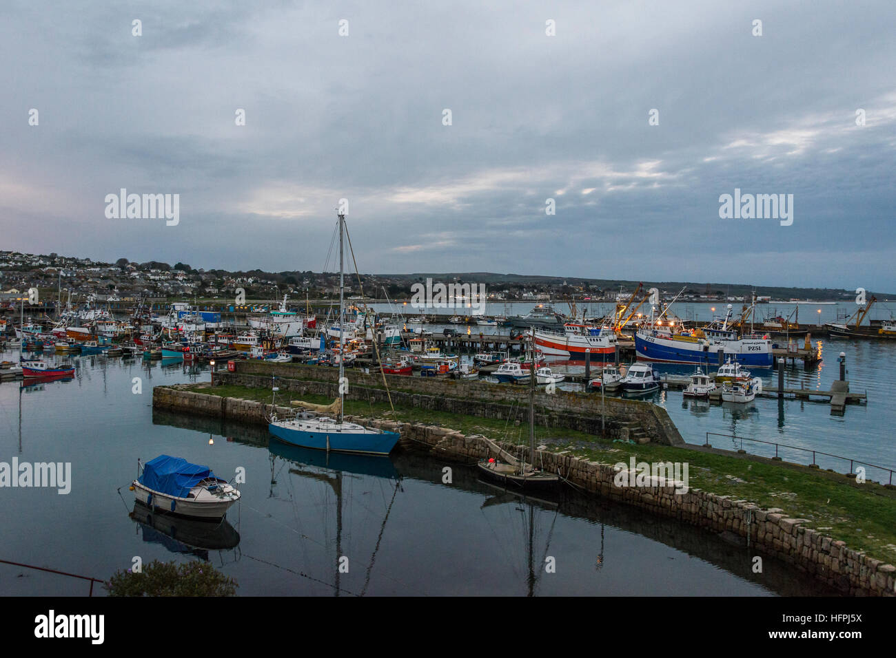 Sunset in Newlyn harbour, Cornwall Stock Photo - Alamy