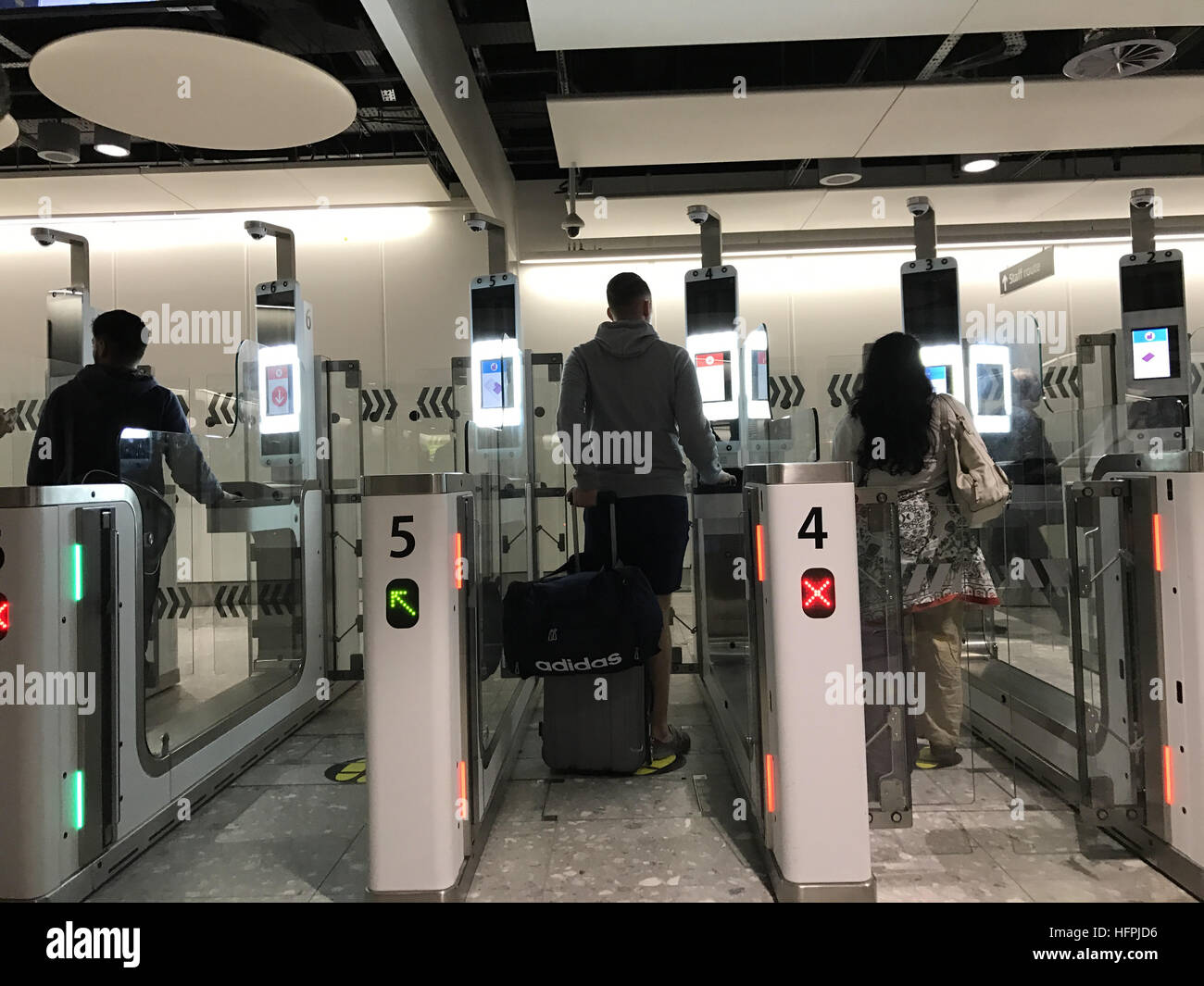 Biometric ‘chipped’ passport entrance. Passengers at Heathrow using ...