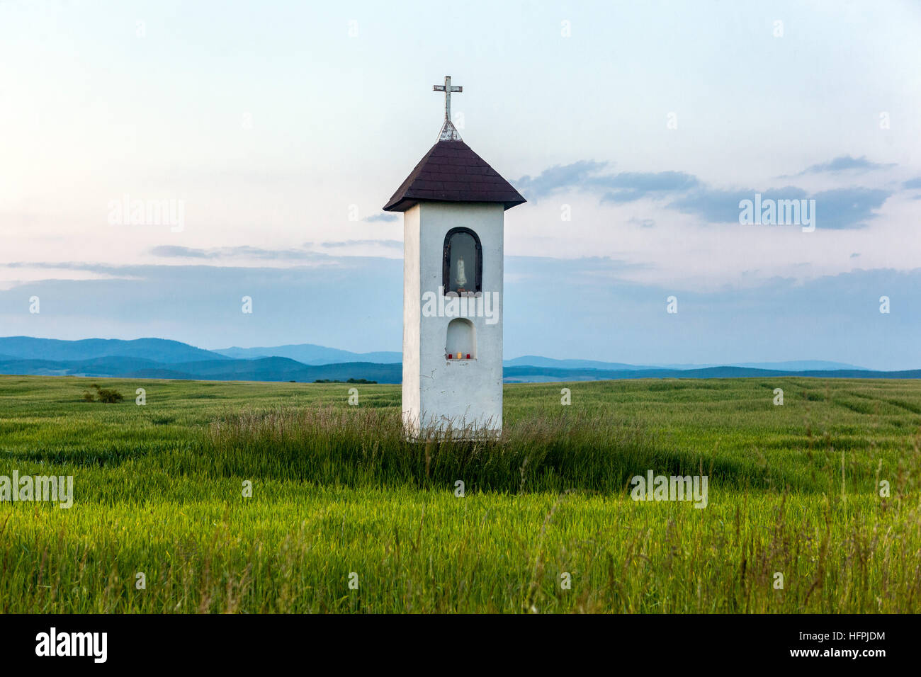A small chapel in the field, South Slovakia Europe grass field Stock ...