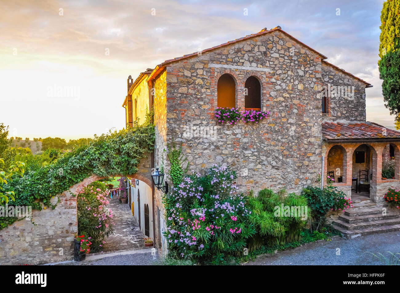 Beautiful old Itanlian stone house with arched windows and typical ...