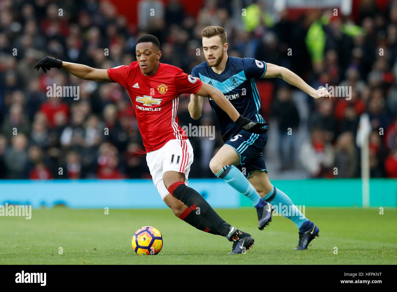 Manchester United's Anthony Martial (left) and Middlesbrough's Calum ...