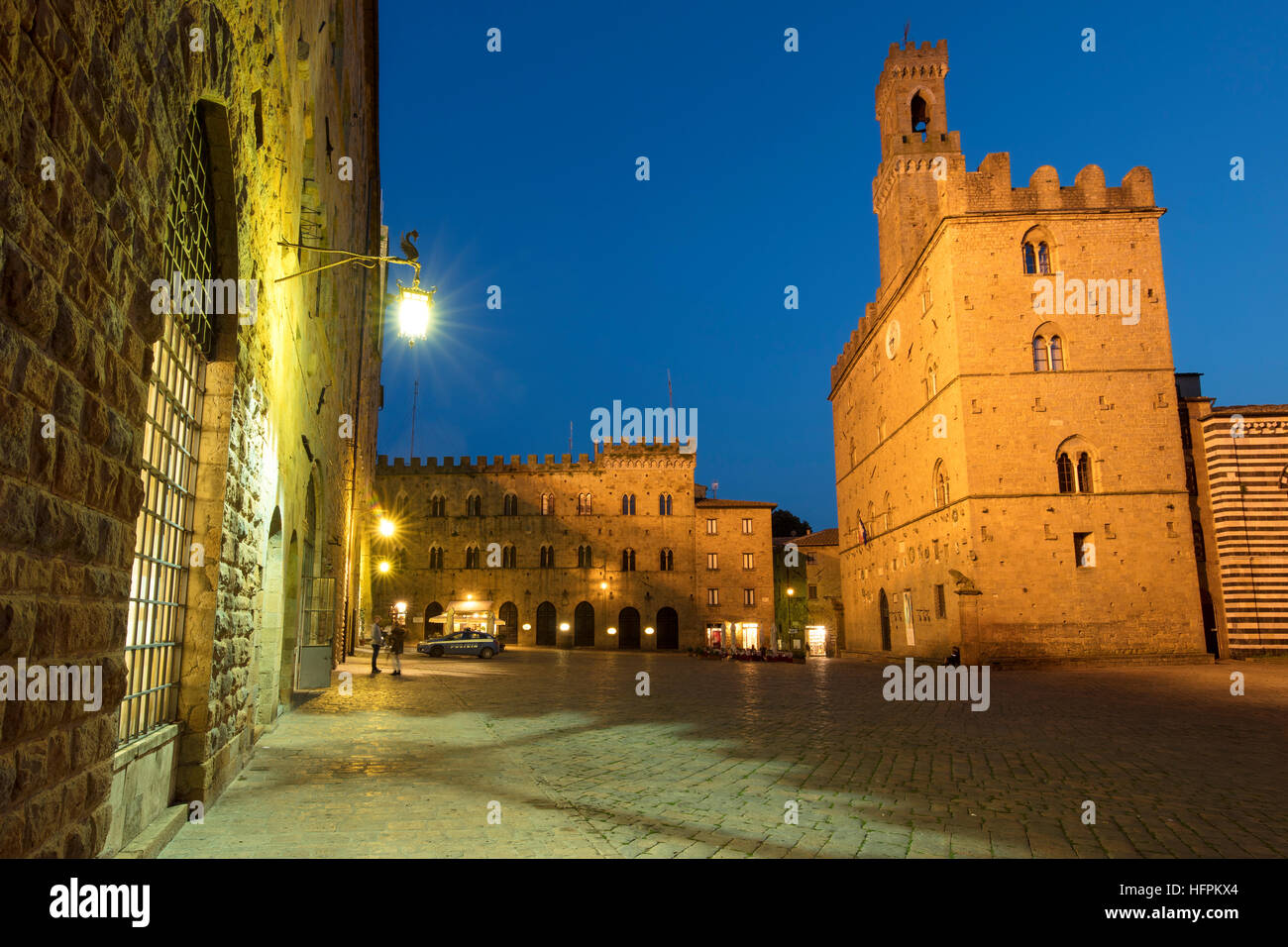 Twilight over Palazzo dei Priori and the medieval town of Volterra ...
