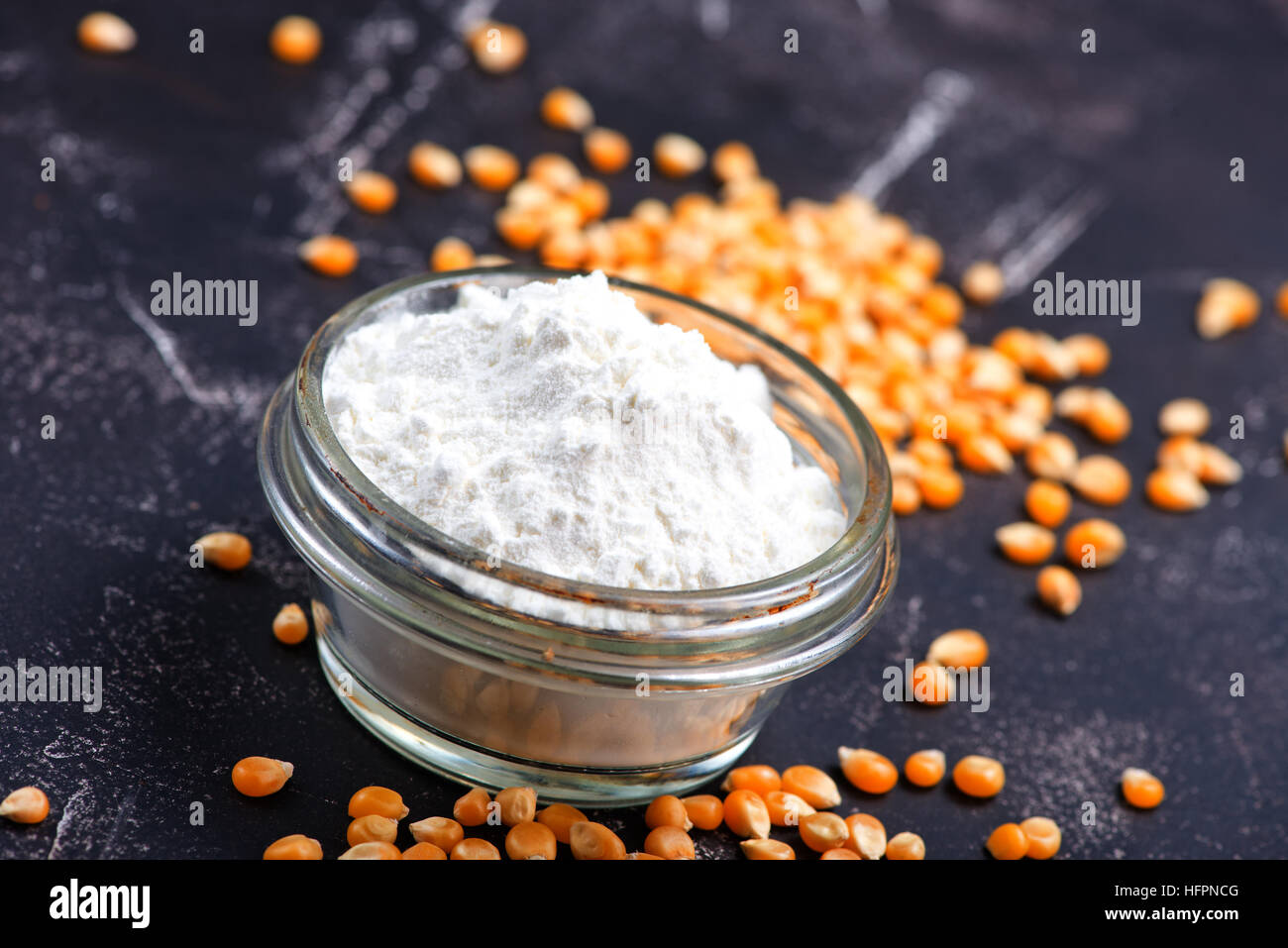 corn starch in bowl and on a table Stock Photo - Alamy