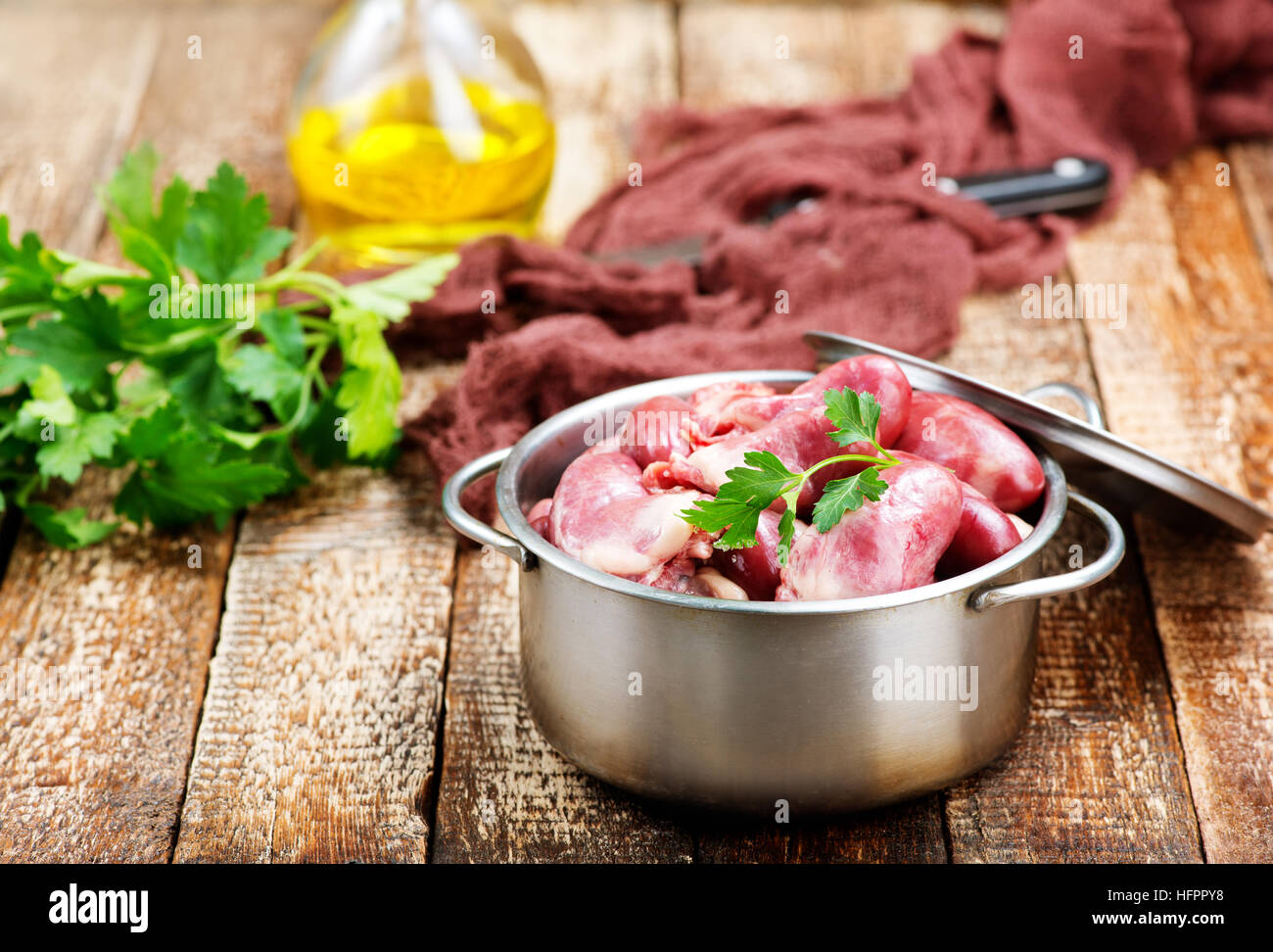 duck hearts in bowl and on a table Stock Photo - Alamy