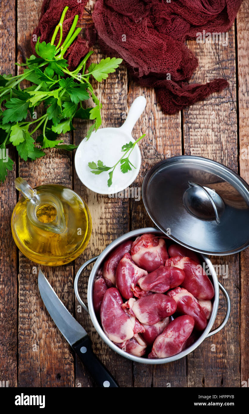 duck hearts in bowl and on a table Stock Photo - Alamy
