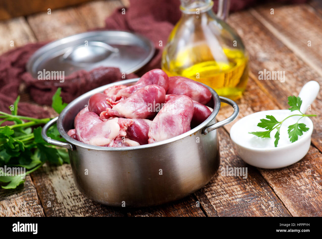 duck hearts in bowl and on a table Stock Photo - Alamy