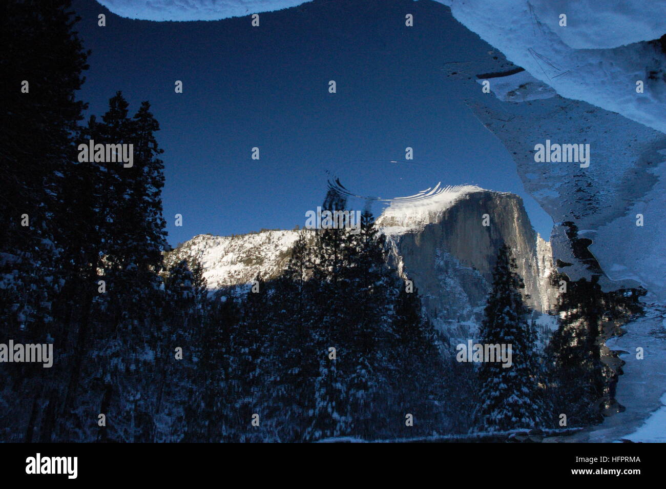 The still waters of Mirror pond give a beautiful reflection shot off ...