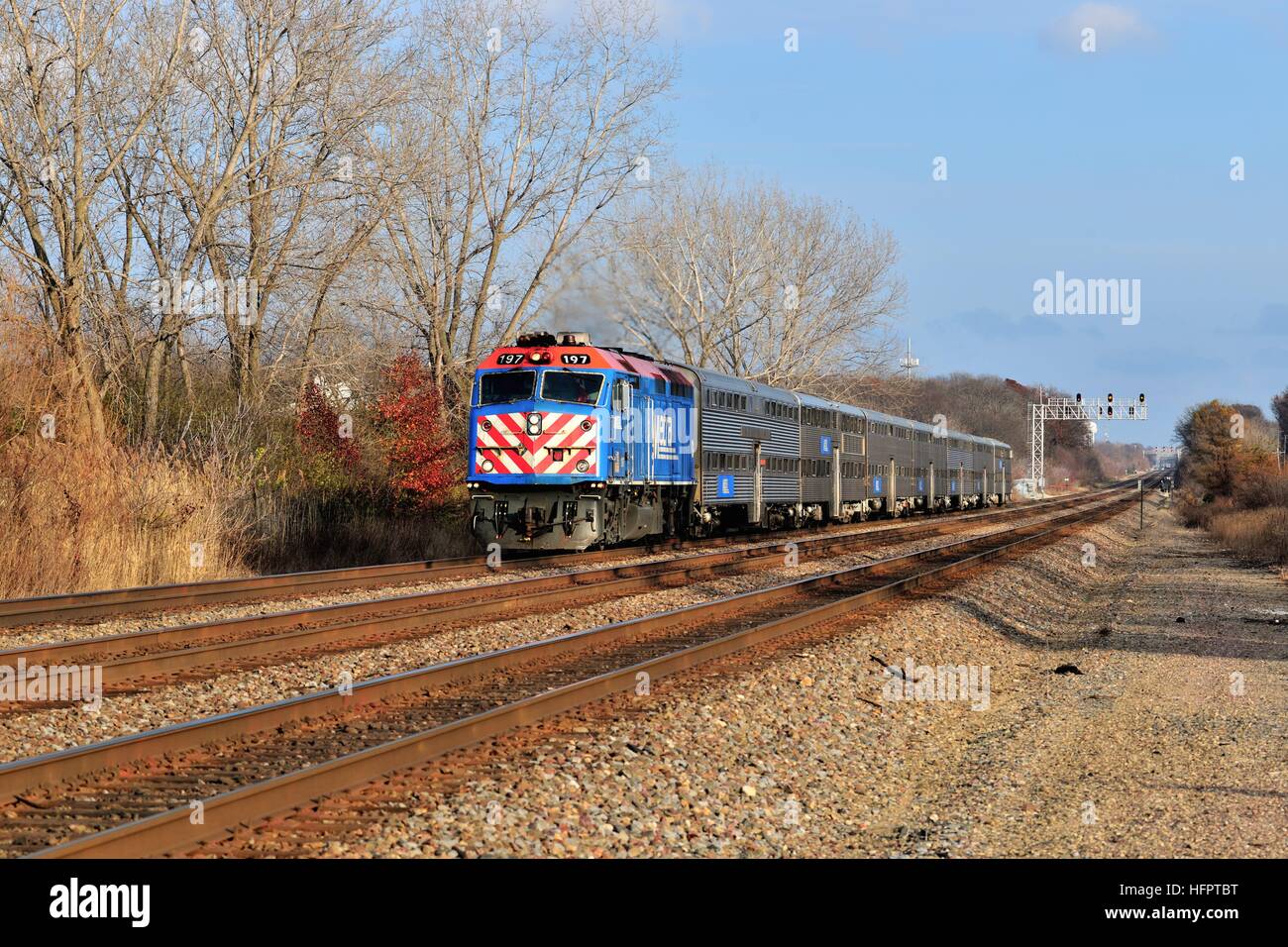 Metra commuter train traveling through the Chicago suburb of Naperville ...