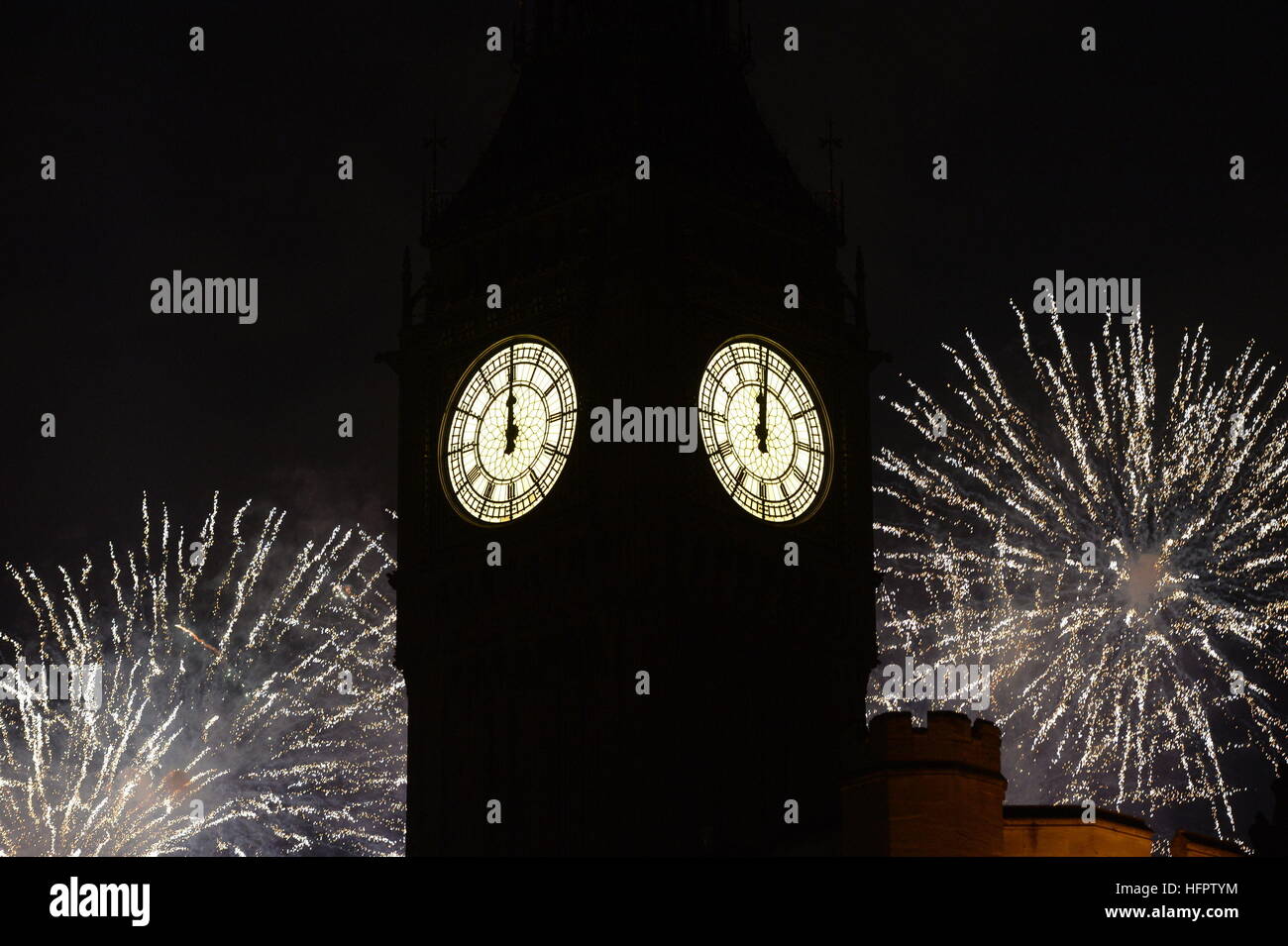 Fireworks light up the sky over Parliament in central London during the ...
