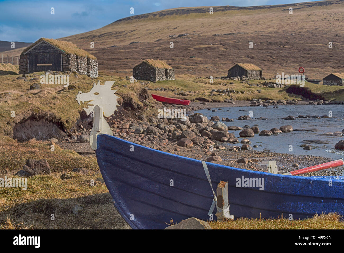Viking boat head with grass roofed boathouses, Leitisvatn Sørvágsvatn ...