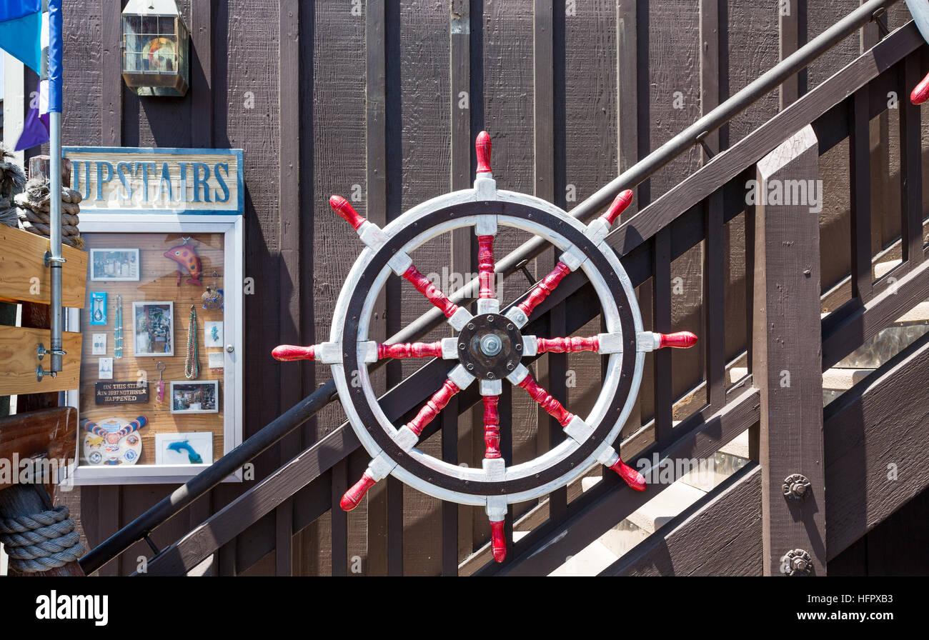 Old red and White Ships Wheel Stock Photo - Alamy
