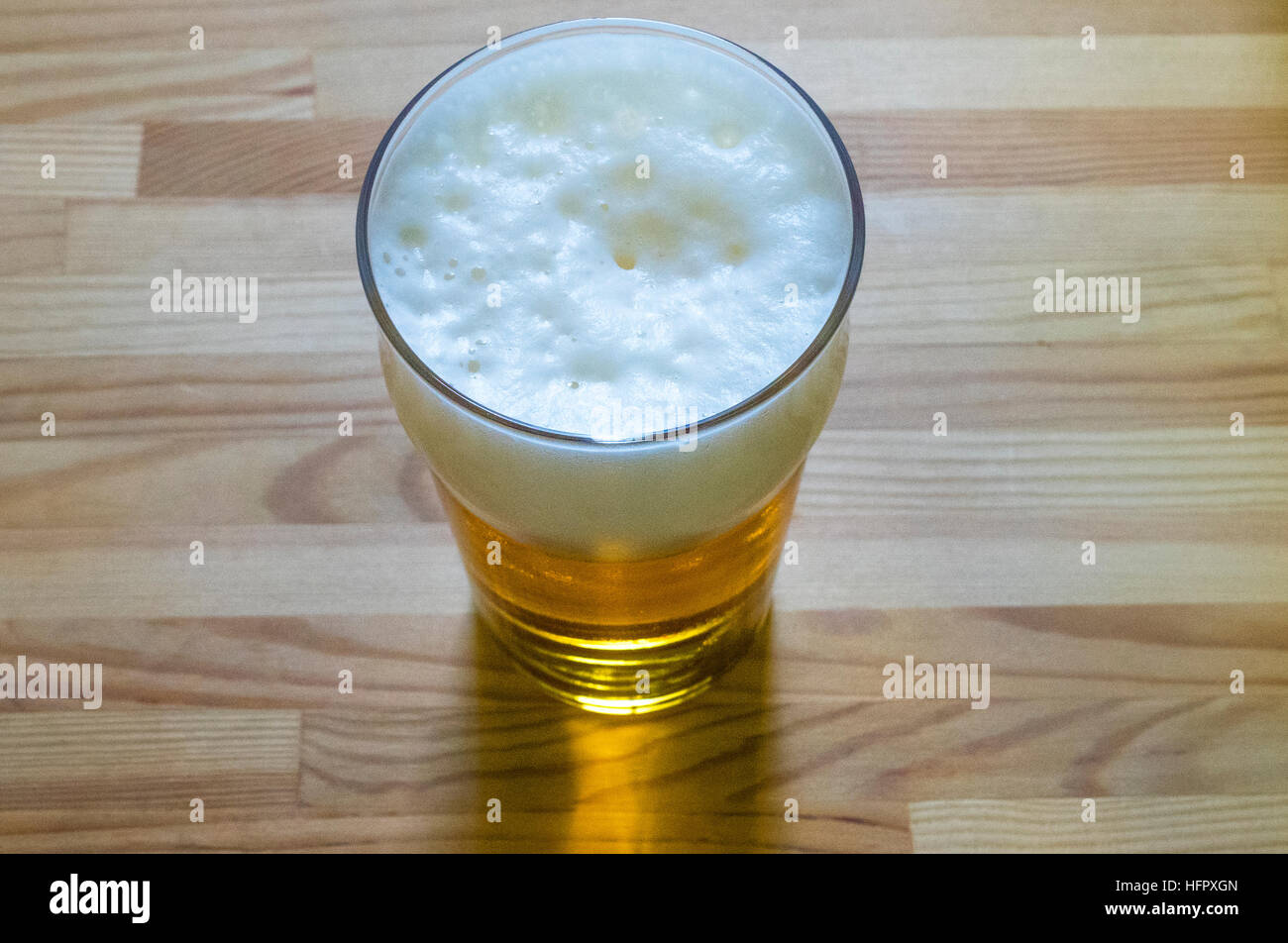 A pint of cool larger beer Stock Photo - Alamy