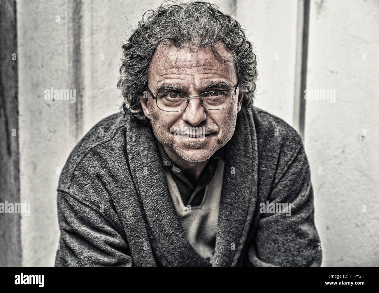 fascinating intellectual middle-aged with unkempt beard and gray hair ...