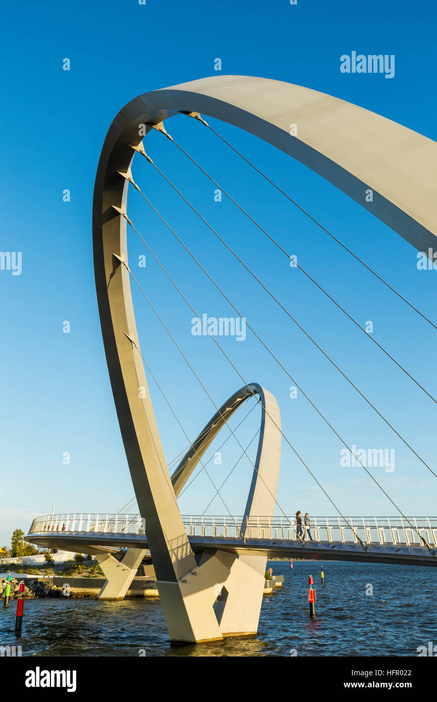 The Elizabeth Quay pedestrian bridge on the Swan River at sunset, Perth ...