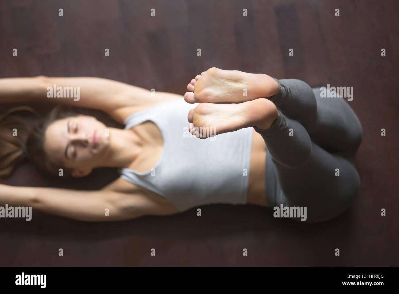 View from above. Upward Extended Feet Yoga Pose Stock Photo - Alamy