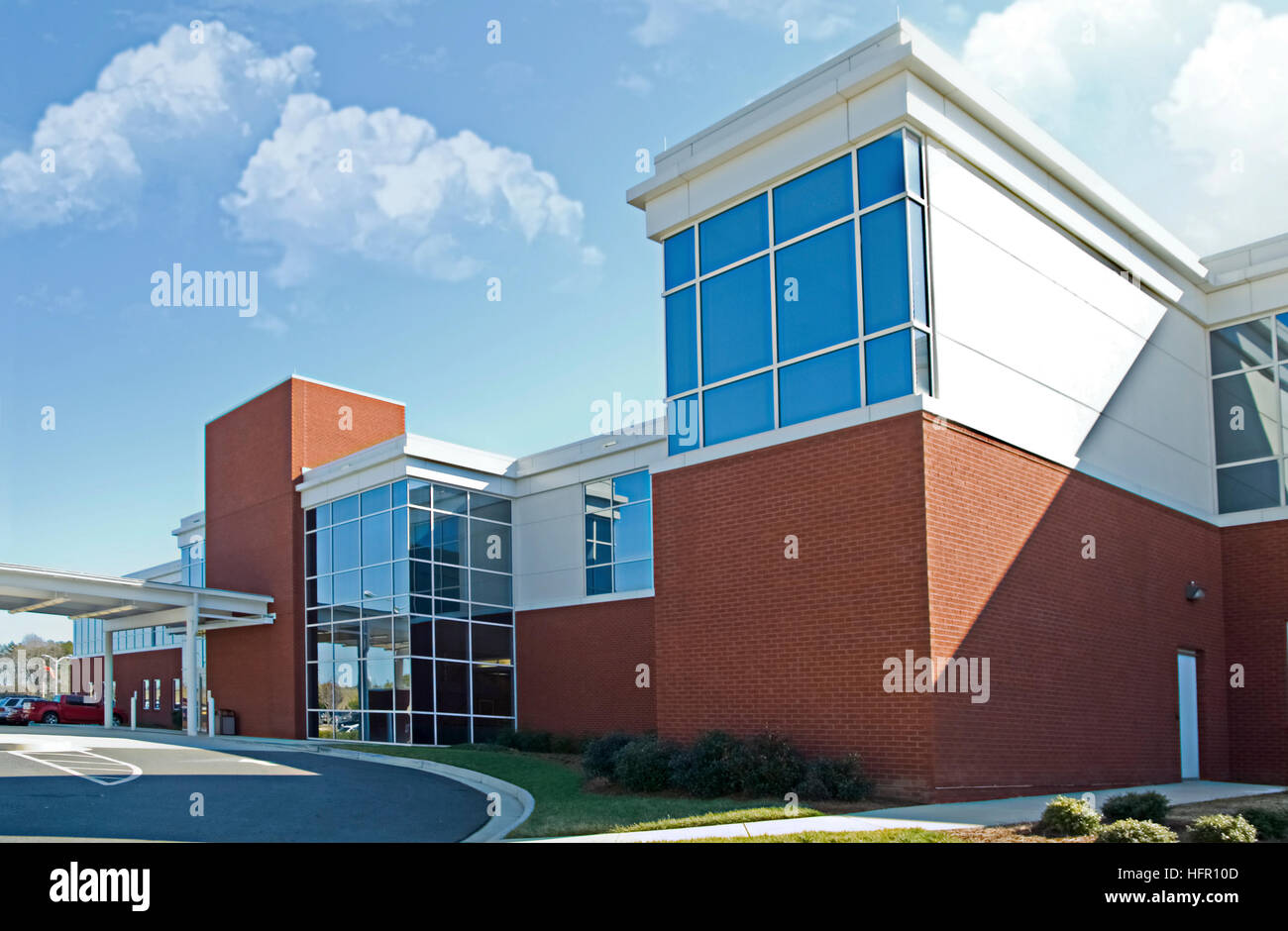 A modern hospital showing the covered entrance area Stock Photo - Alamy