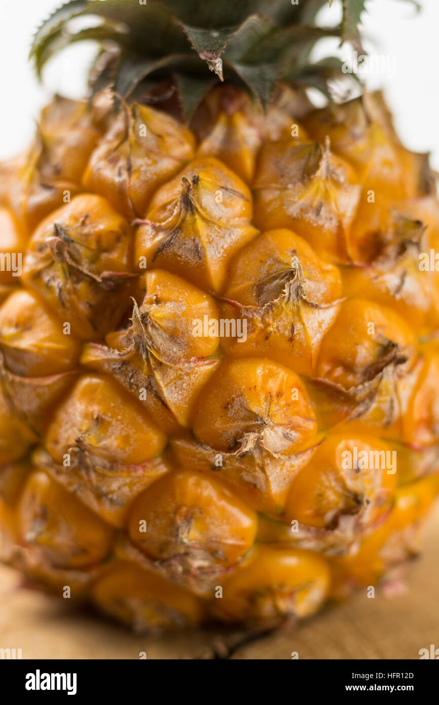 Ripe juicy fresh baby pineapple - ingredient for healthy food Stock ...