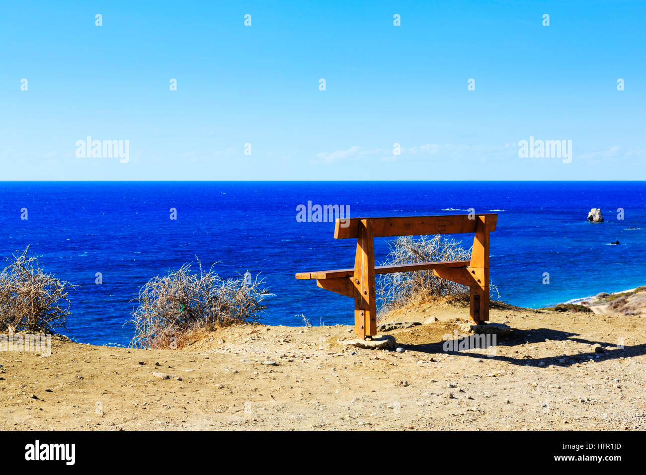 Empty bench seat on the cliff top. Paphos, Cyprus Stock Photo - Alamy