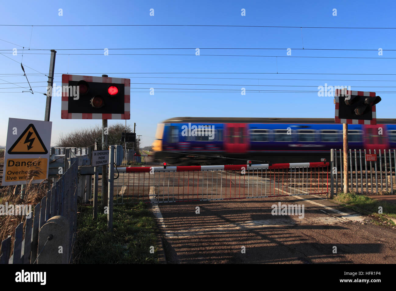 Speeding Train Overhead Live Wires Danger Sign at unmanned level ...