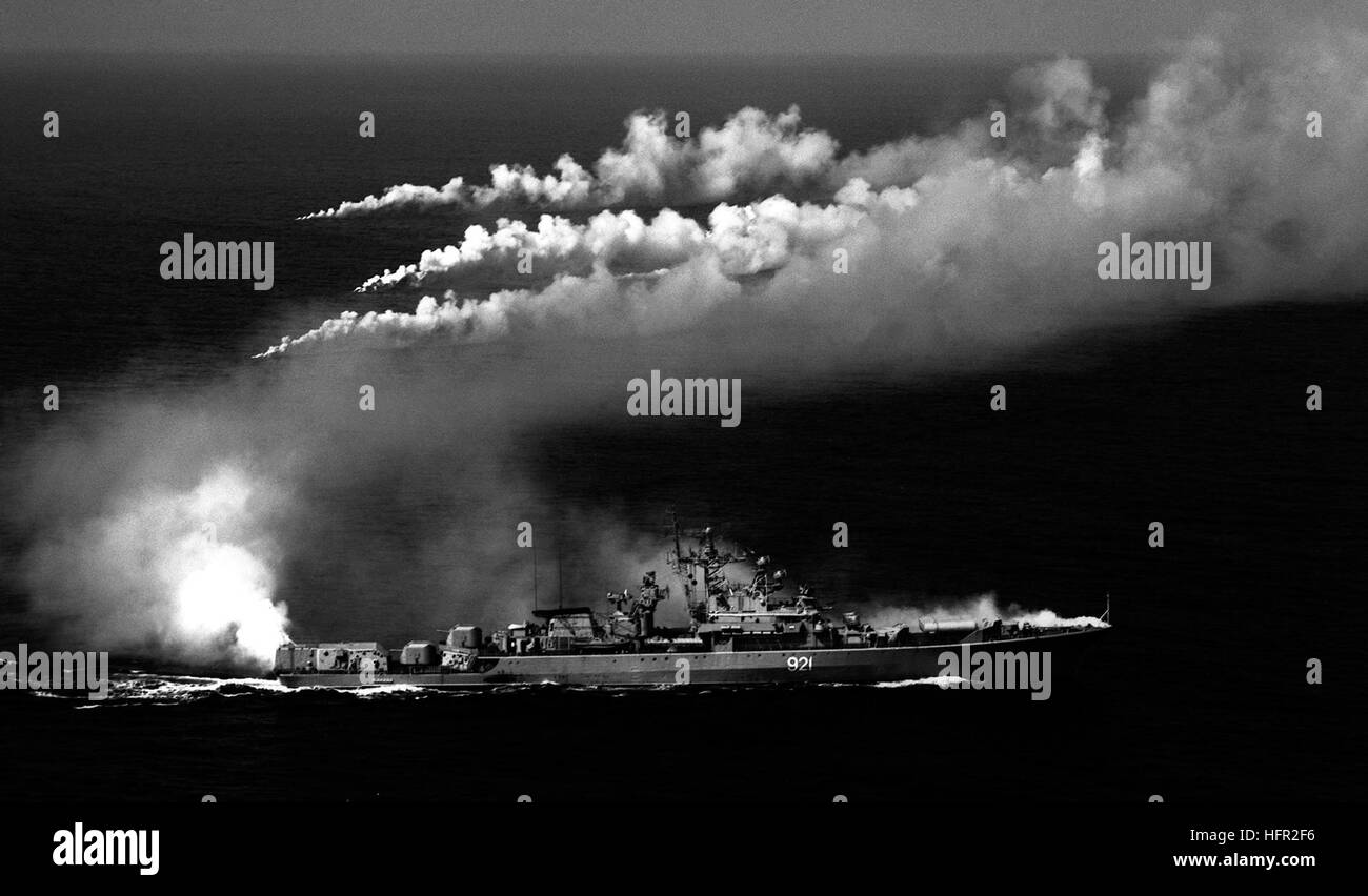 The Krivak I-class guided missile frigate Zharky deploys a smoke screen ...