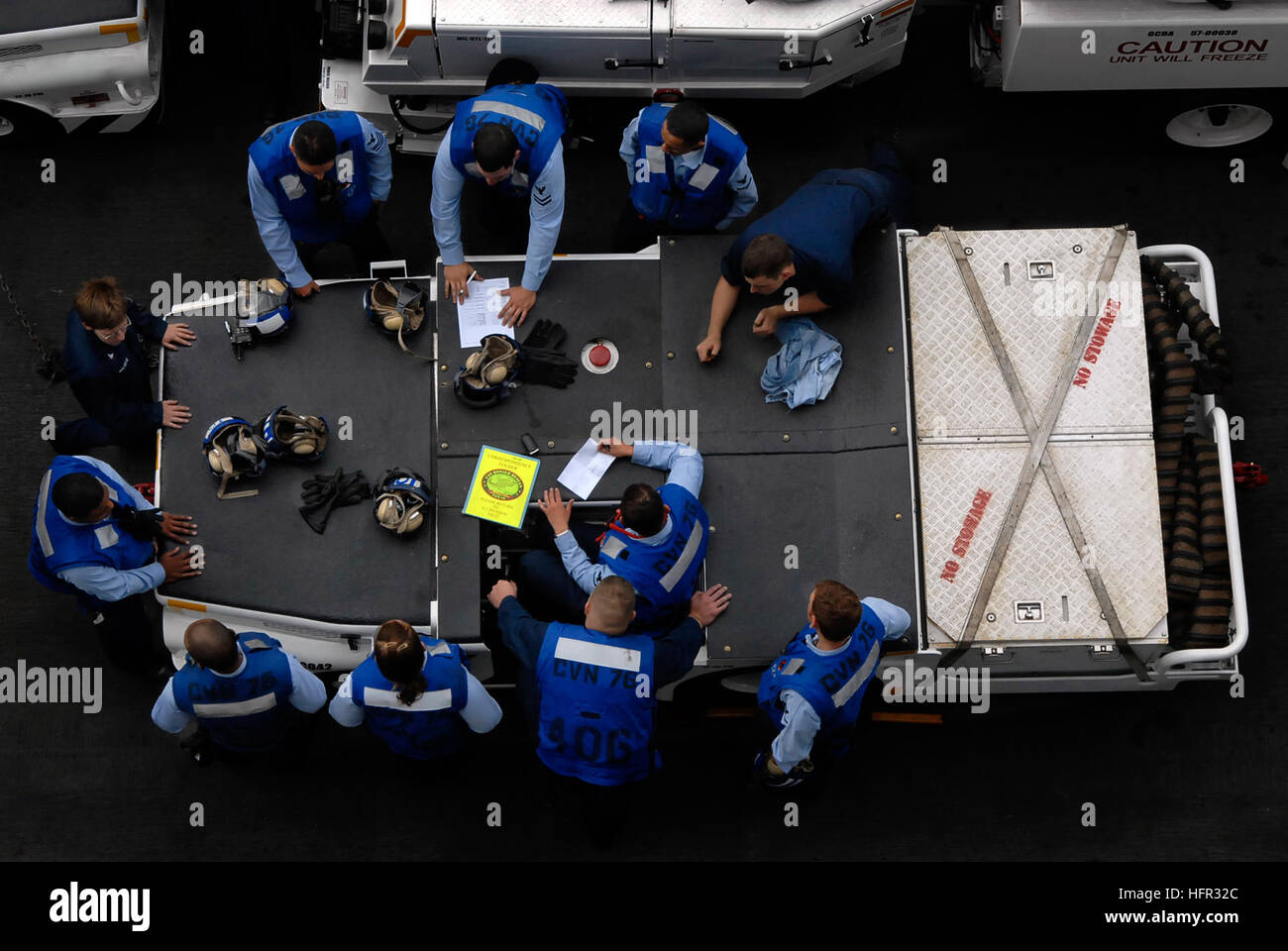 Us navy flight deck tractor hi-res stock photography and images - Alamy
