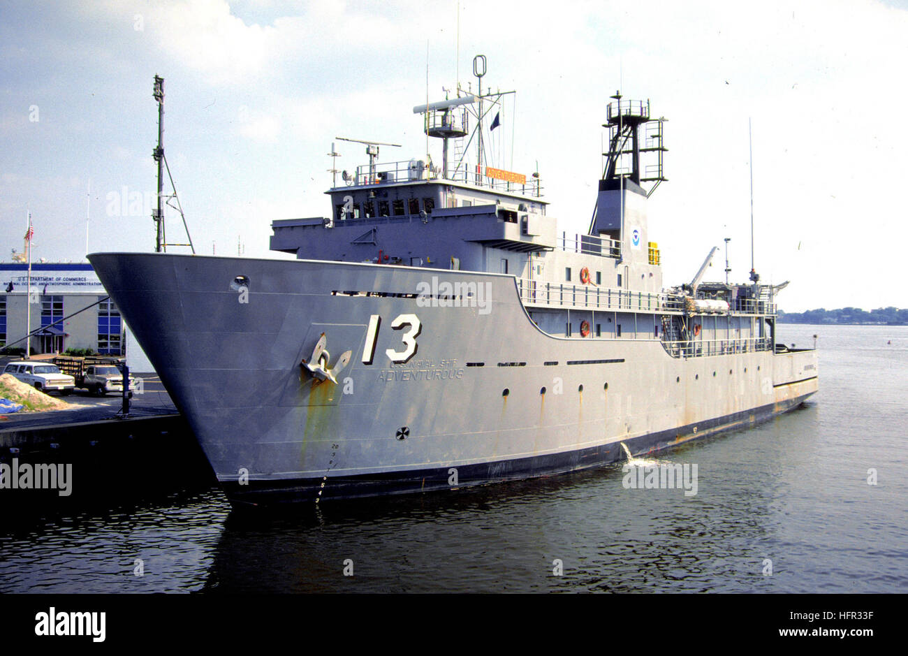 The ocean surveillance ship USNS ADVENTUROUS (T-AGOS-13) stands tied to ...