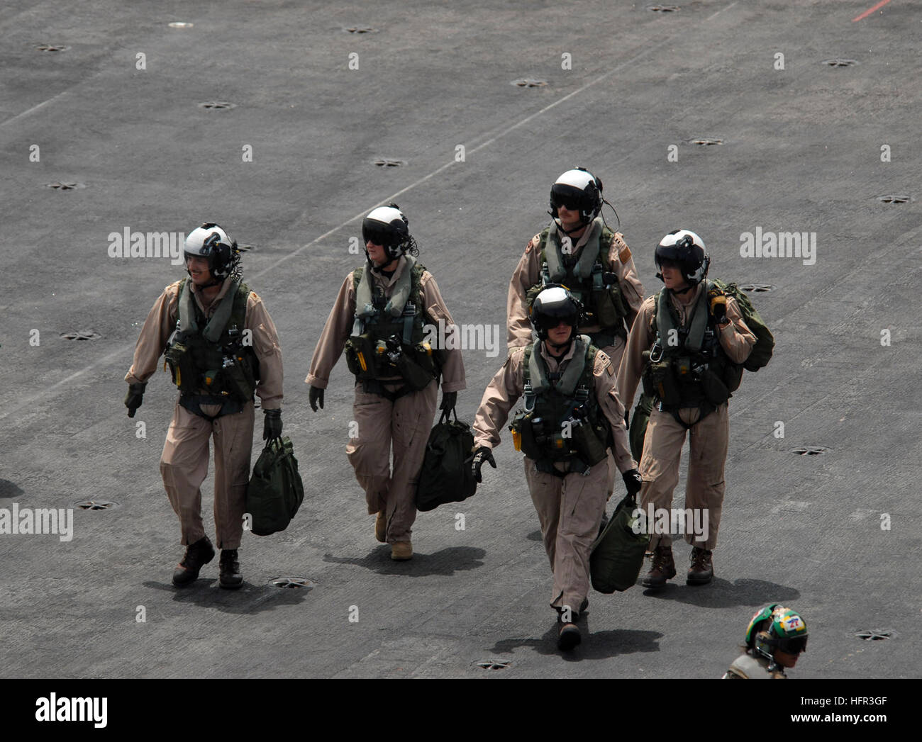 080828-N-3610L-119 INDIAN OCEAN (August 28, 2008) Pilots walk across ...