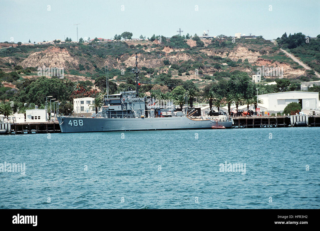 A port beam view of the ocean minesweeper USS CONQUEST (MSO-488) tied ...