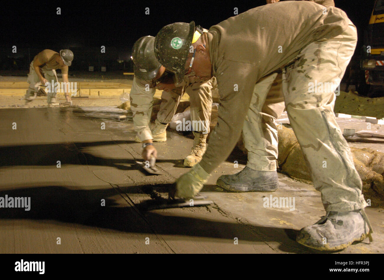 Seabees from Naval Mobile Construction Battalion Seven pour concrete ...