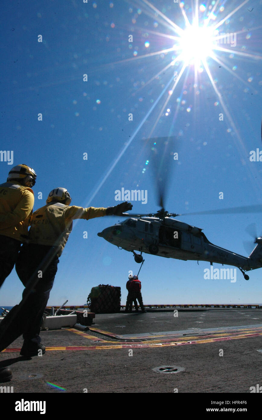 060405-N-6403R-007 Atlantic Ocean (April 5, 2006) Ð Sailors attach a ...