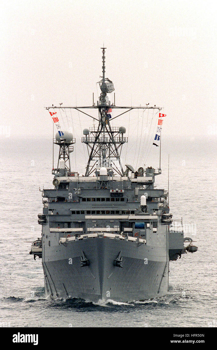 The USS CORONADO (AGF 11), follows the USS TARAWA (LHA 1), during ...
