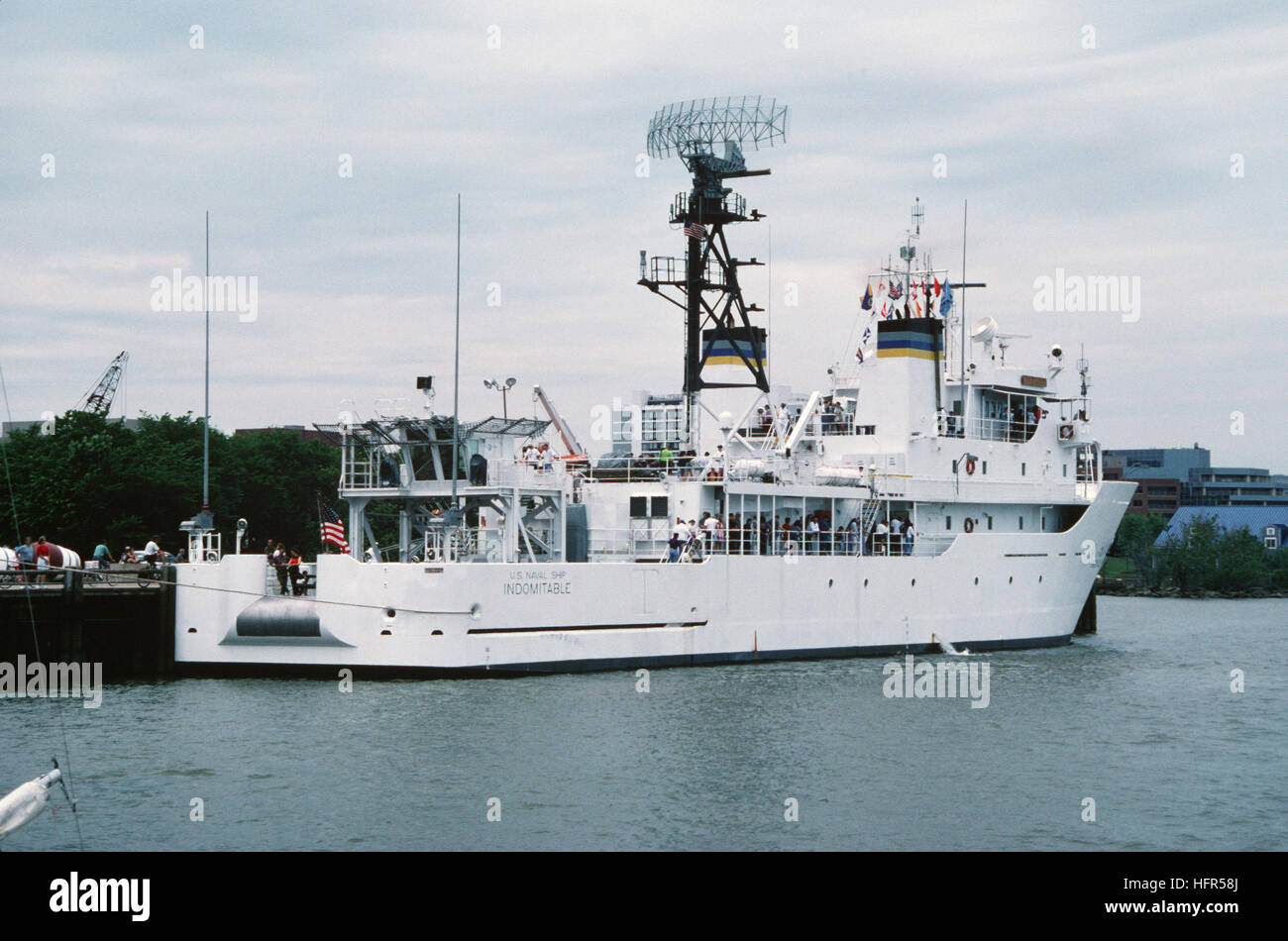 Starboard quarter view of the Military Sealift Command (MSC) surveillance ship USNS INDOMITABLE ...