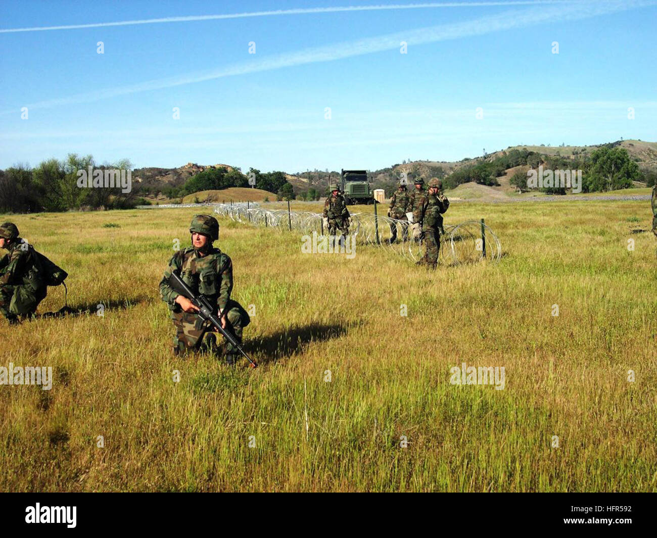 Triple strand concertina wire hi-res stock photography and images - Alamy