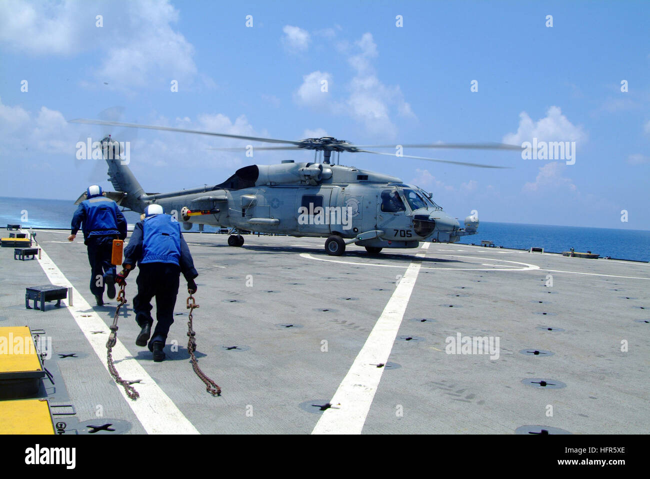 Flight deck personnel tie down hi-res stock photography and images - Alamy