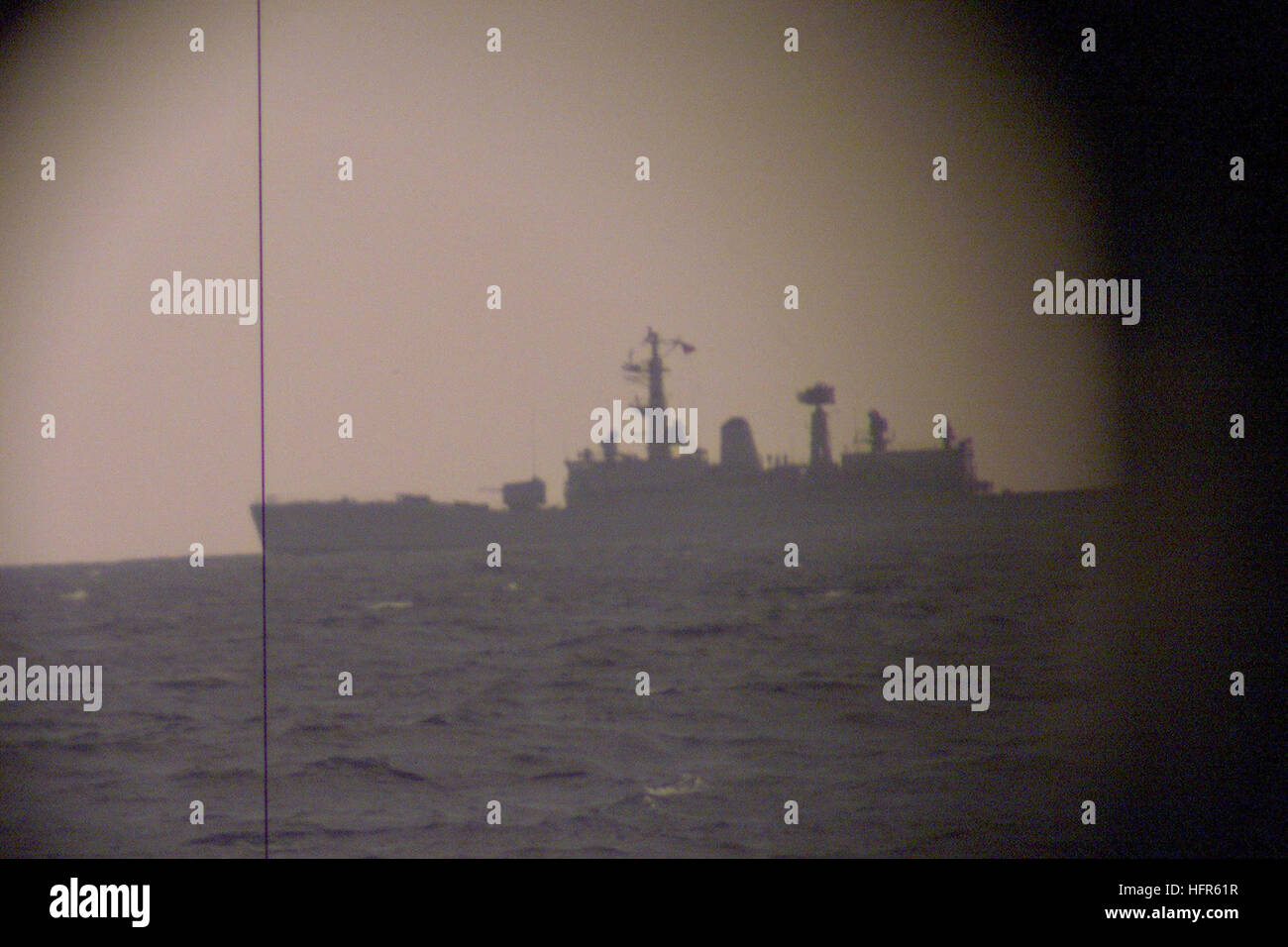 USS REUBEN JAMES (FFG 57), as seen through the periscope of the ...